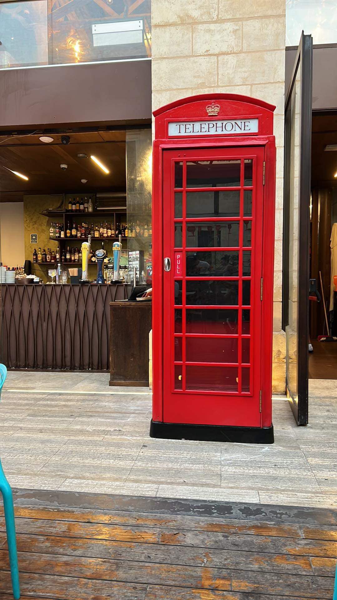 The red telephone box is back in its rightful place - Is-Suq Tal-Belt